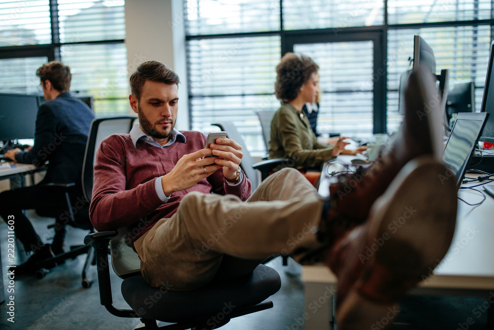 Kicking back Stock Photo | Adobe Stock