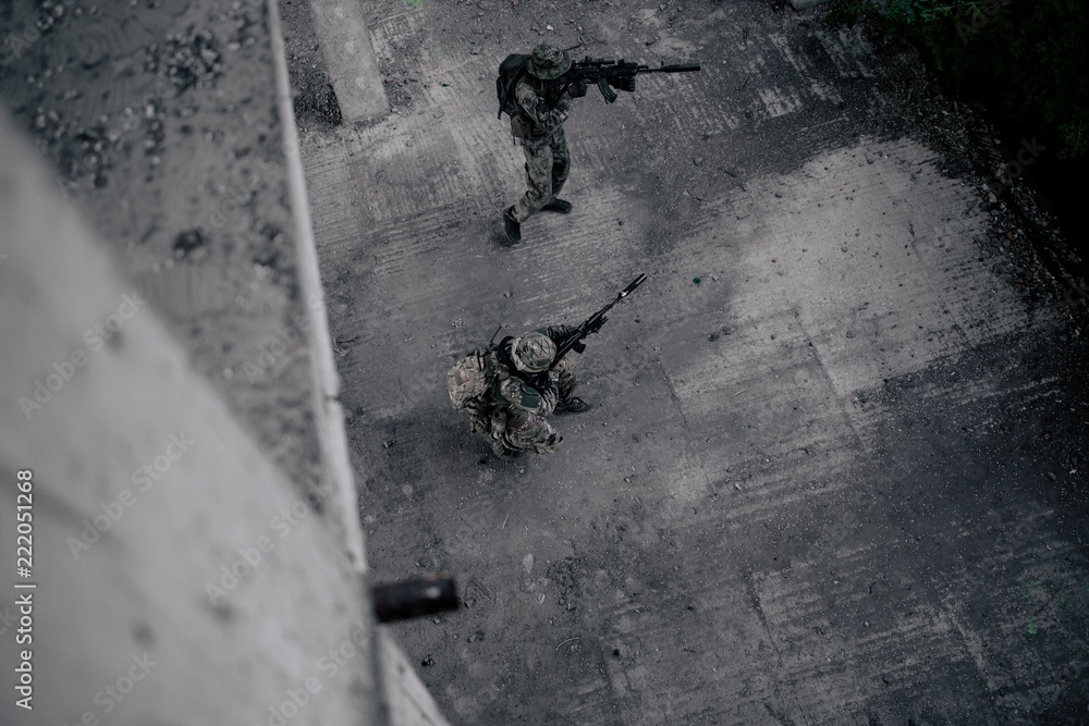 Military intelligence of the destroyed building, military soldiers ...