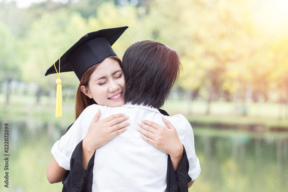 Beautiful Attractive Asian Student graduate and family hug celebrating ...