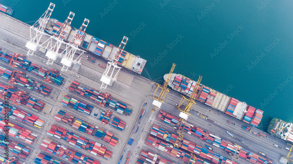 Aerial view container ship from sea port warehouse waiting for delivery ...