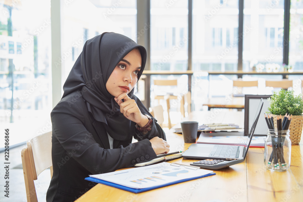 Portrait cute muslim woman sitting and use laptop computer. Stock Photo ...