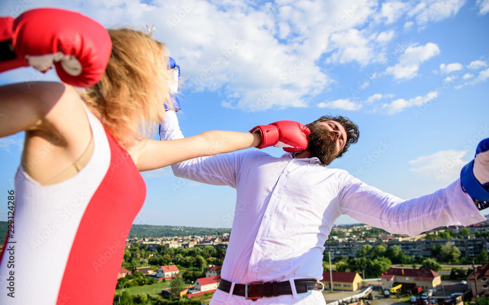 Let her win concept. Couple boxing gloves fight sky background. Girl ...