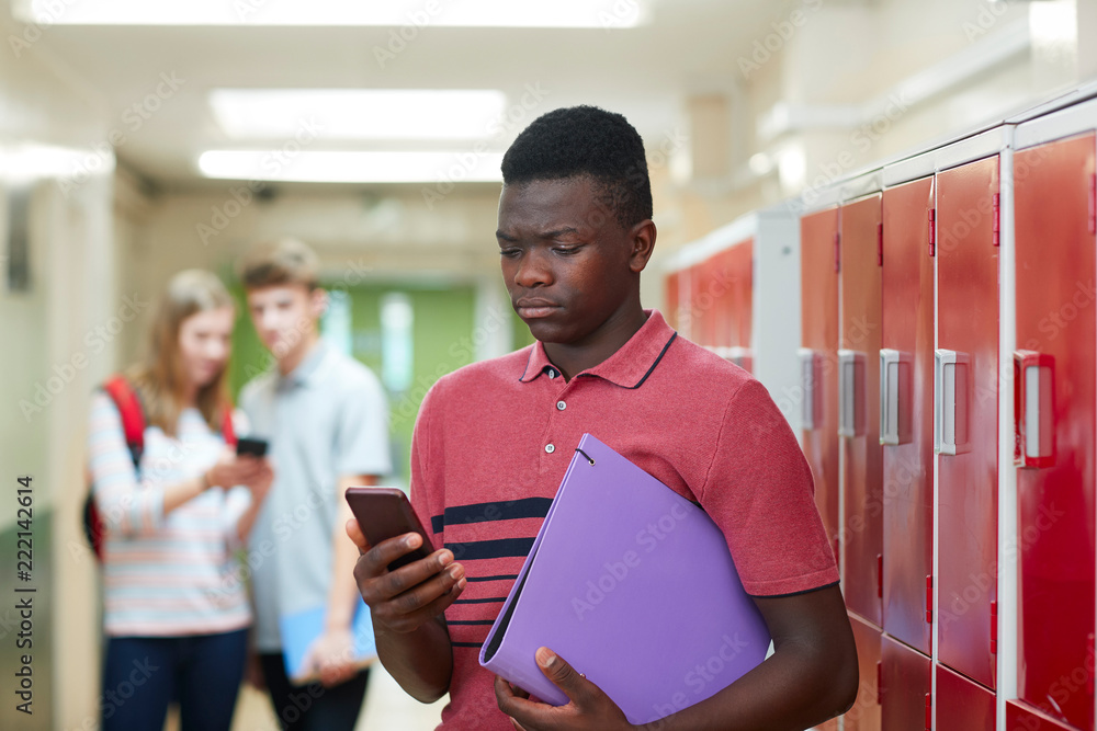 Portrait Of Male High School Student Bullied By Text Message In ...