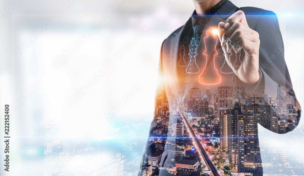 Business strategy concept.Businessman presenting chess To reflect the ...