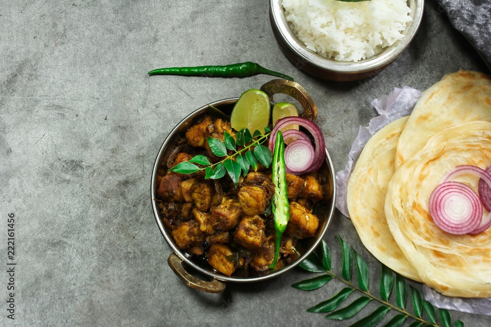 Kerala Spicy Beef Roast or Fry with Porotta and rice, top view Stock ...