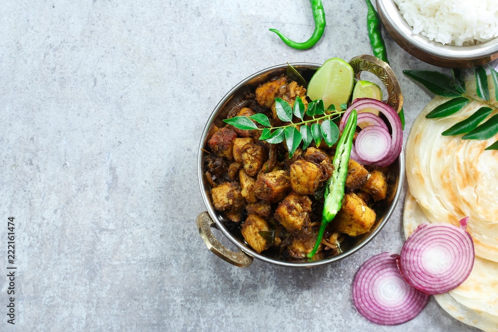 Kerala Pork Fry or Roast served with Parotta and rice,Top down view ...