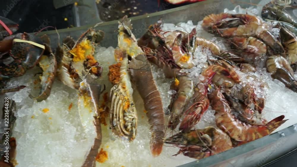 Variety seafood lobster, mantis, shrimp, octopus and crab on ice at the ...