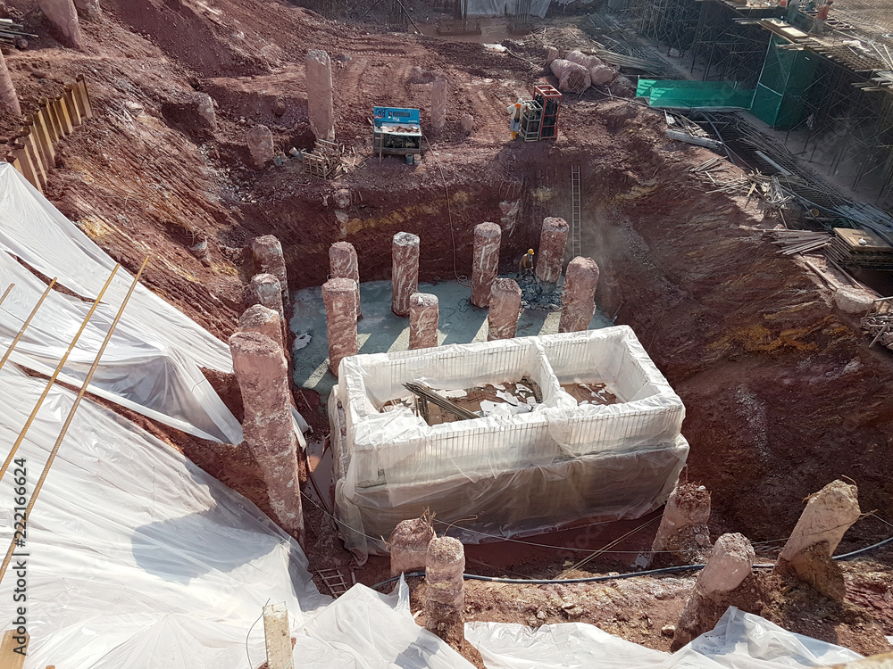 Reinforce concrete bore pile at the construction site. Cut to level to ...