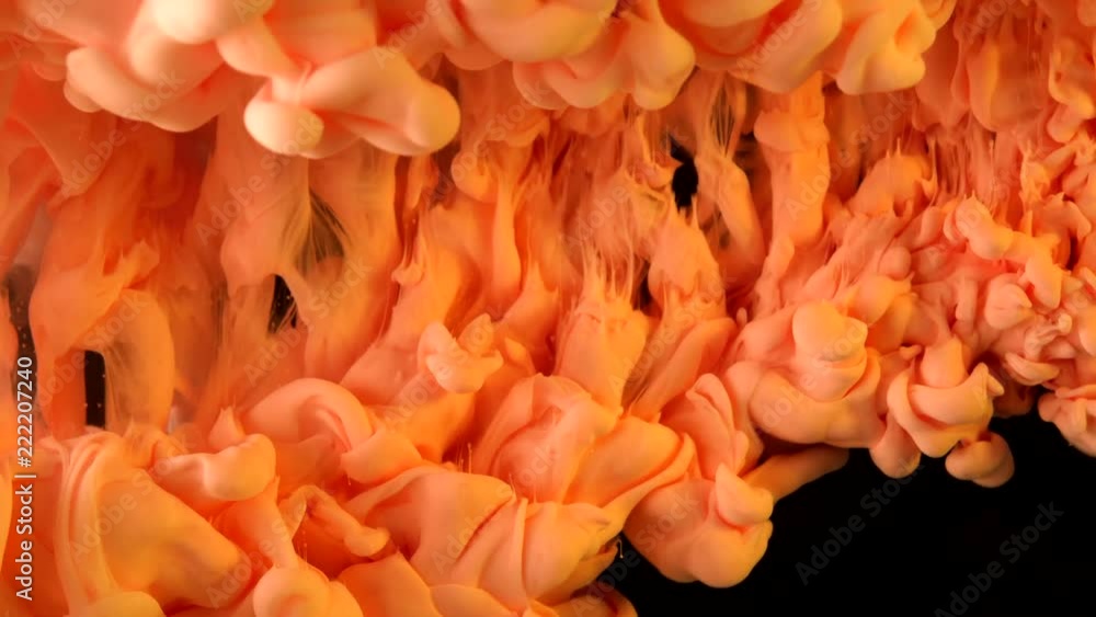 Peach colour Ink underwater. Orange paint or smoke. Can be used as ...