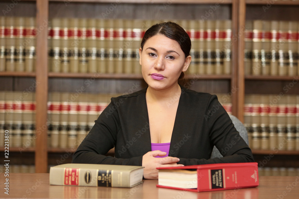 Young attractive female activist. Young woman lawyer in law office ...