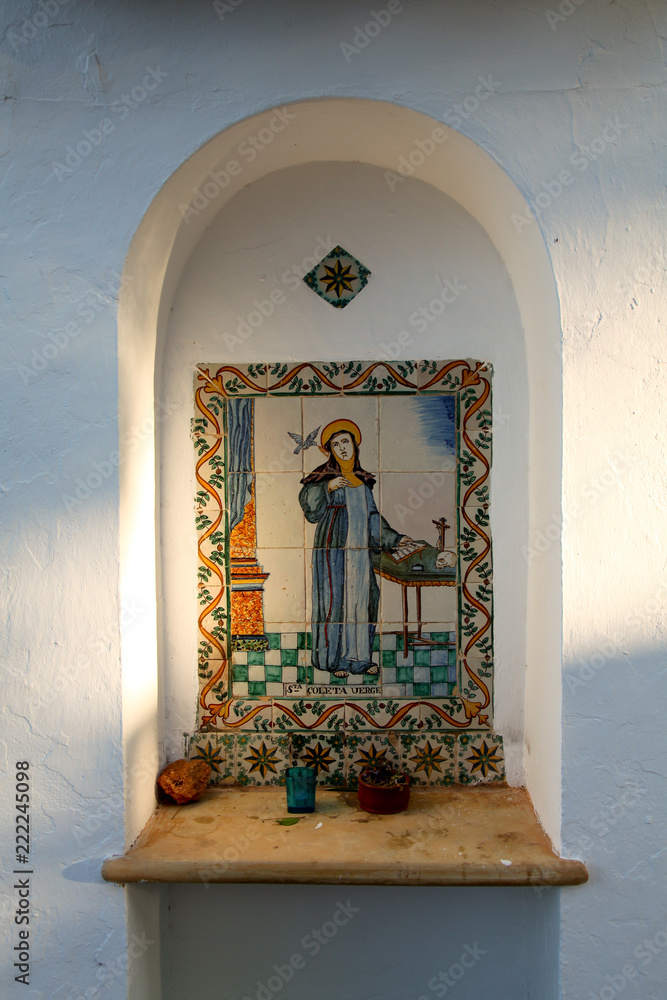 Religious shrine of Santa Coleta Uerge in wall in Spain Stock Photo ...