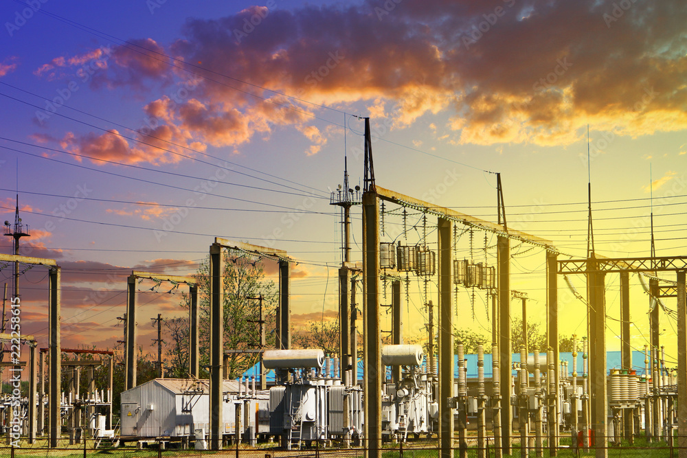High voltage electric power station - electric poles and lines on ...