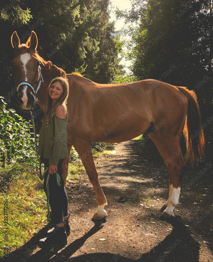 Mädchen mit Pferd im Wald Stock Photo | Adobe Stock