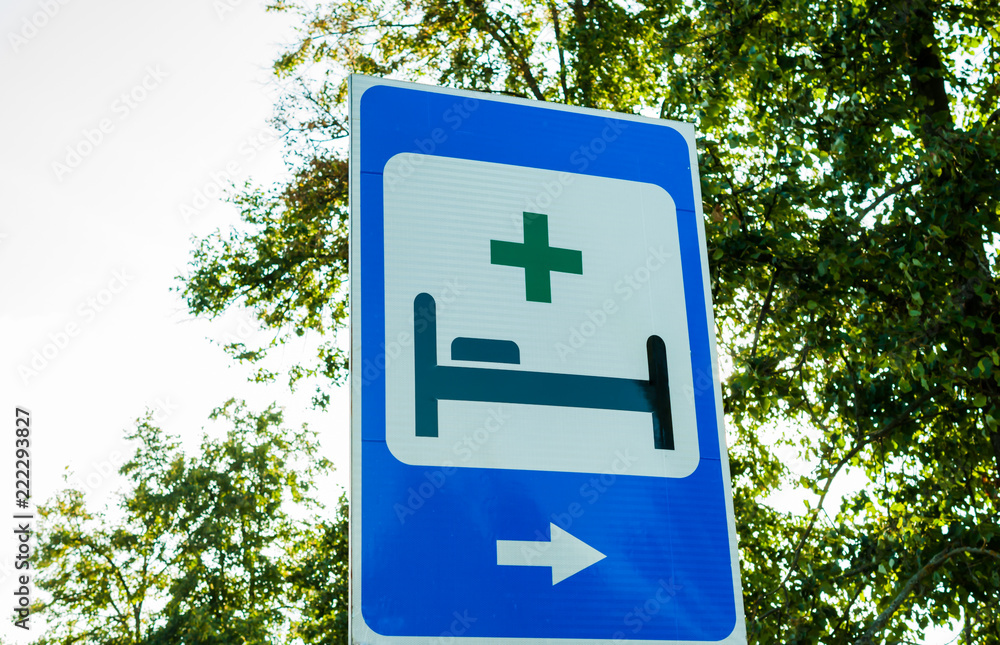 Traffic sign hospital and emergency medical aid Stock Photo | Adobe Stock