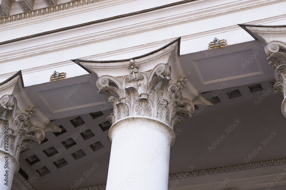 Vintage style facade of a building with columns. Old solid pillars of ...