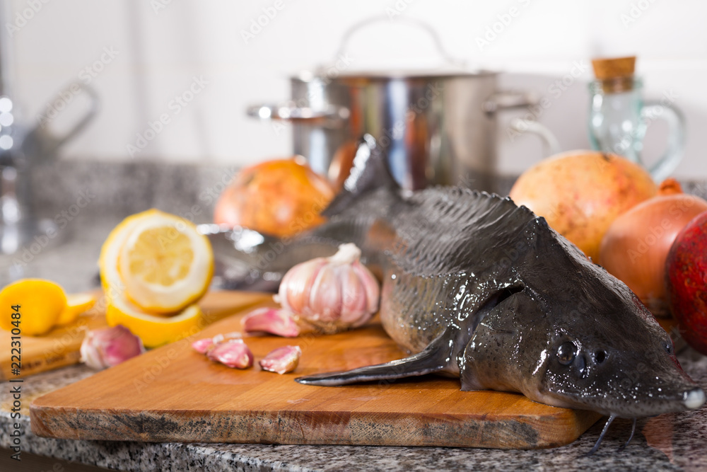 Raw uncooked fish sturgeon at plate before preparing Stock-Foto | Adobe ...