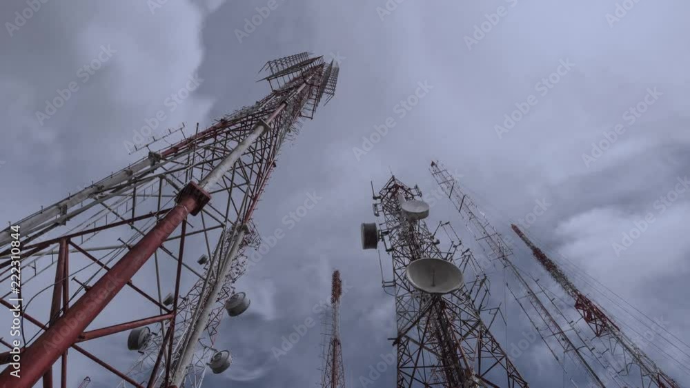 Antenna tower, low angle view. Telecommunication towers include of radio microwave and ...