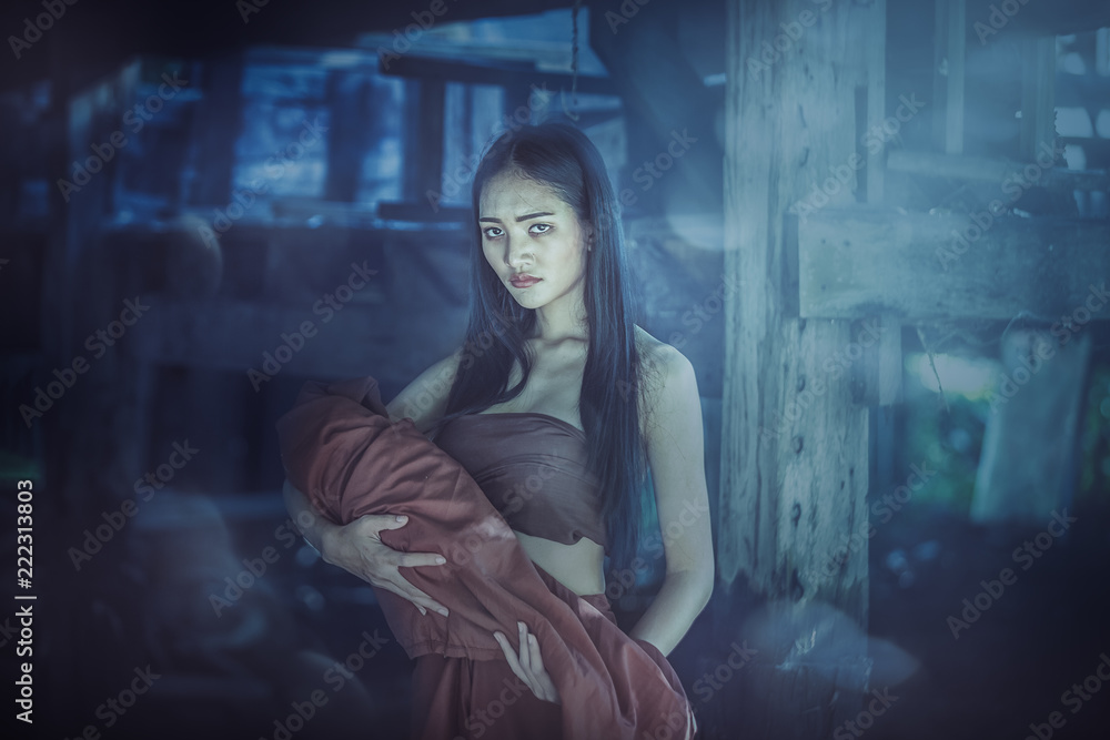 Legend of Mae Nak Phra Khanong. Thai Ghost concept, Horror scene of scary woman with her baby ...