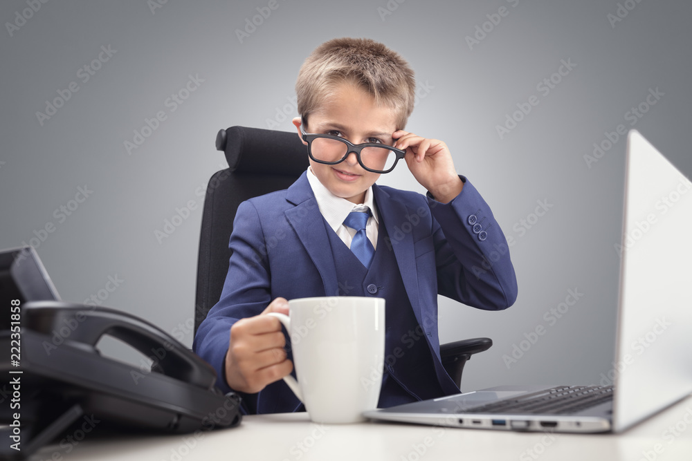 Young confident executive businessman boss boy in office Stock Photo ...