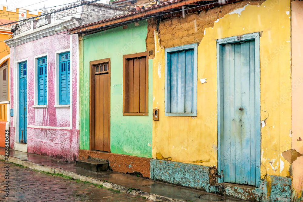 Colorful semi-detached houses, with exposed brick on the facade, in a ...
