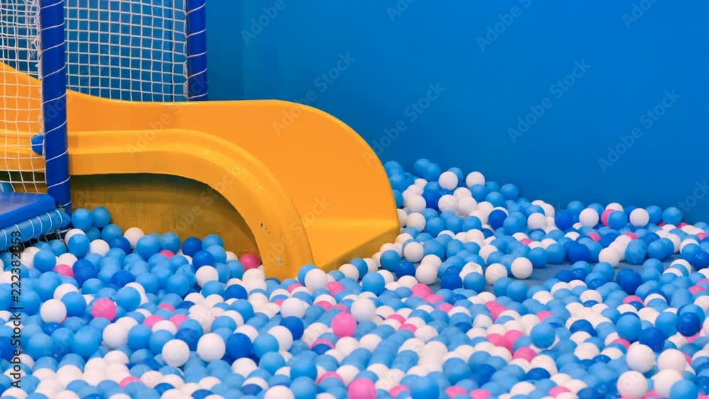 Cute asian child boy having fun to play slider in the playground and ...