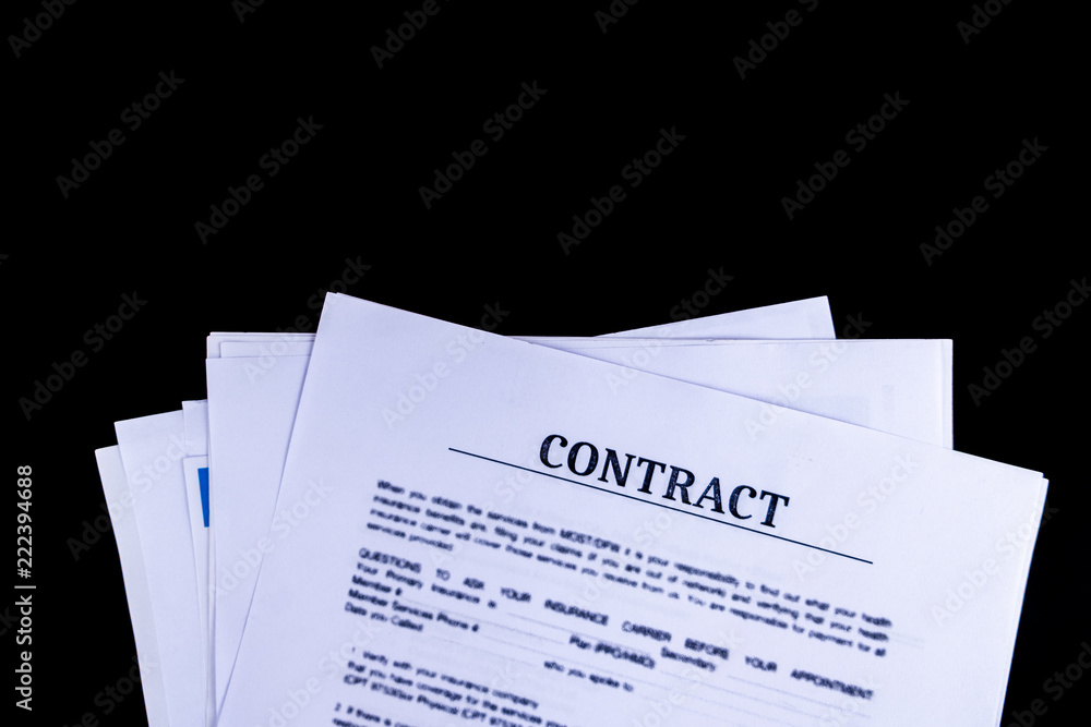 Legal Contract Agreement Documents Papers with black background and top ...