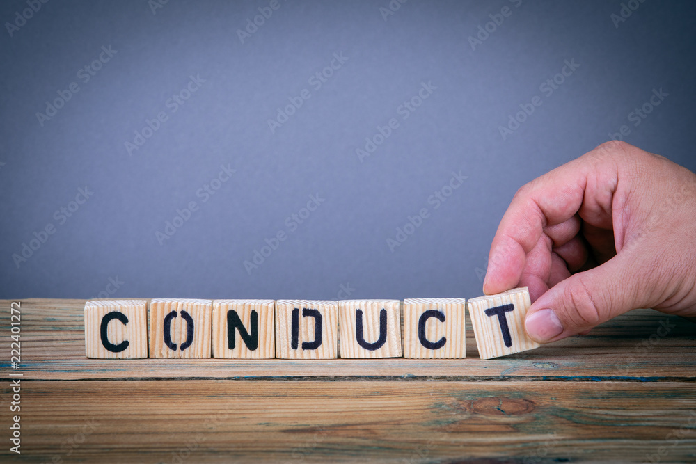 conduct, wooden letters on the office desk, informative and ...