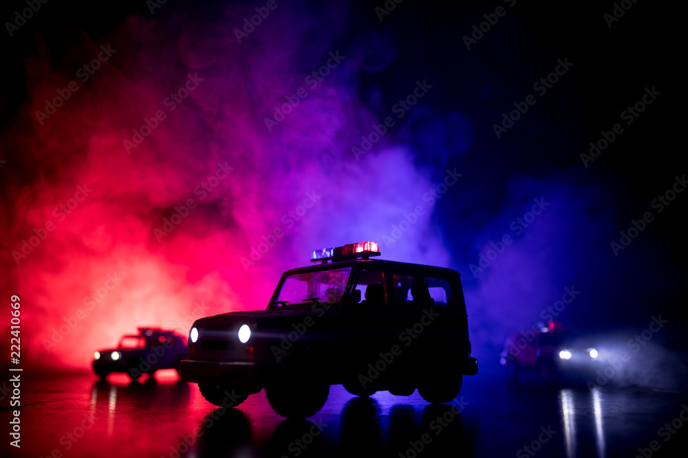 Police car chasing a car at night with fog background. 911 Emergency ...