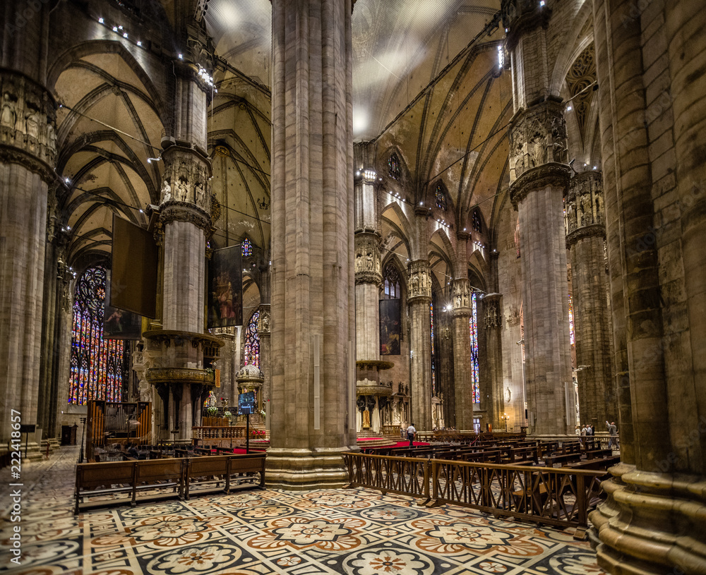 Columns, ceiling, vaults, stainglass windows, alters of interior of the ...