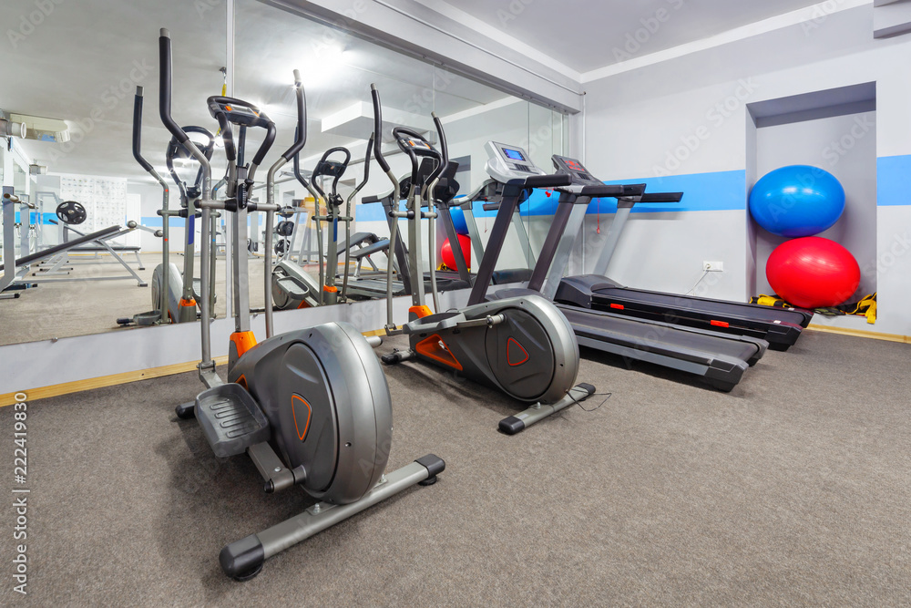 Cardio zone in modern gym. Stock Photo | Adobe Stock