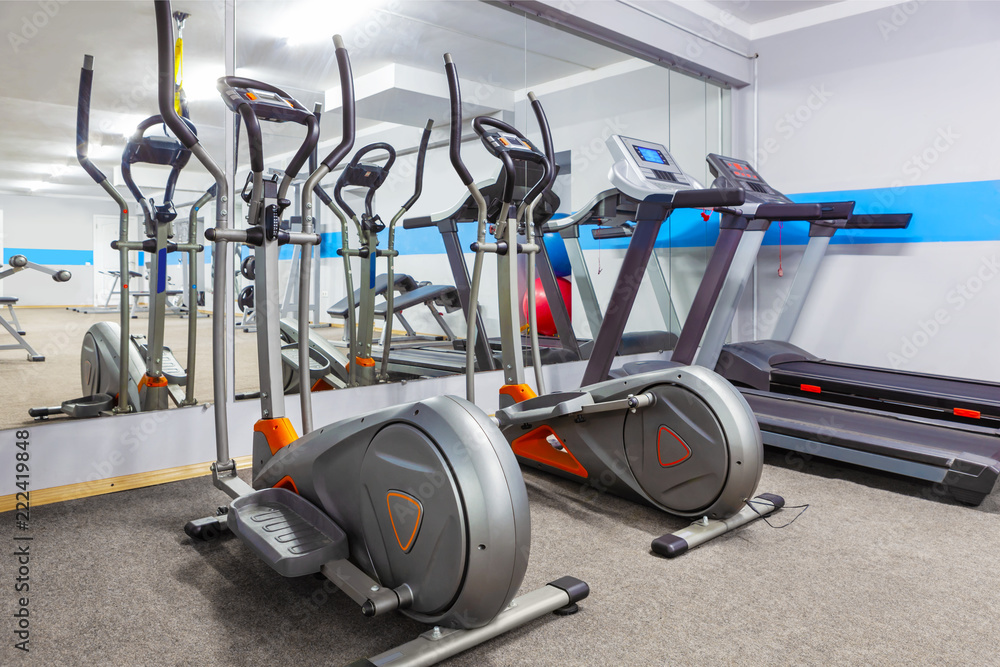 Cardio zone in modern gym. Stock Photo | Adobe Stock