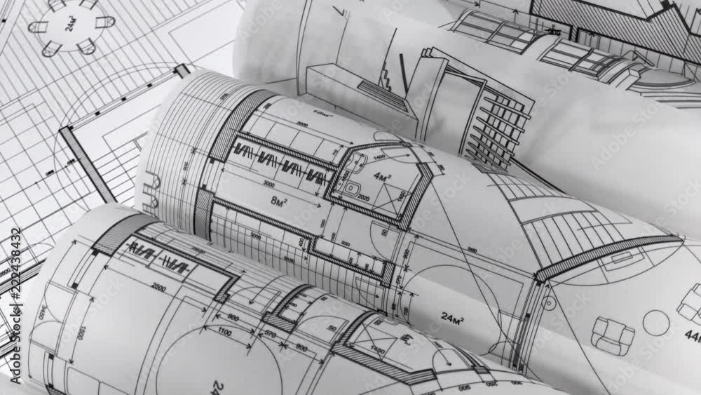 Blueprints - rolls of architectural drawings smoothly rotate on the ...