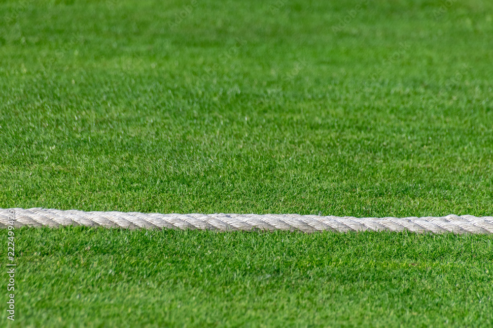Rope marking the boundary of a rural village cricket pitch Stock Photo ...