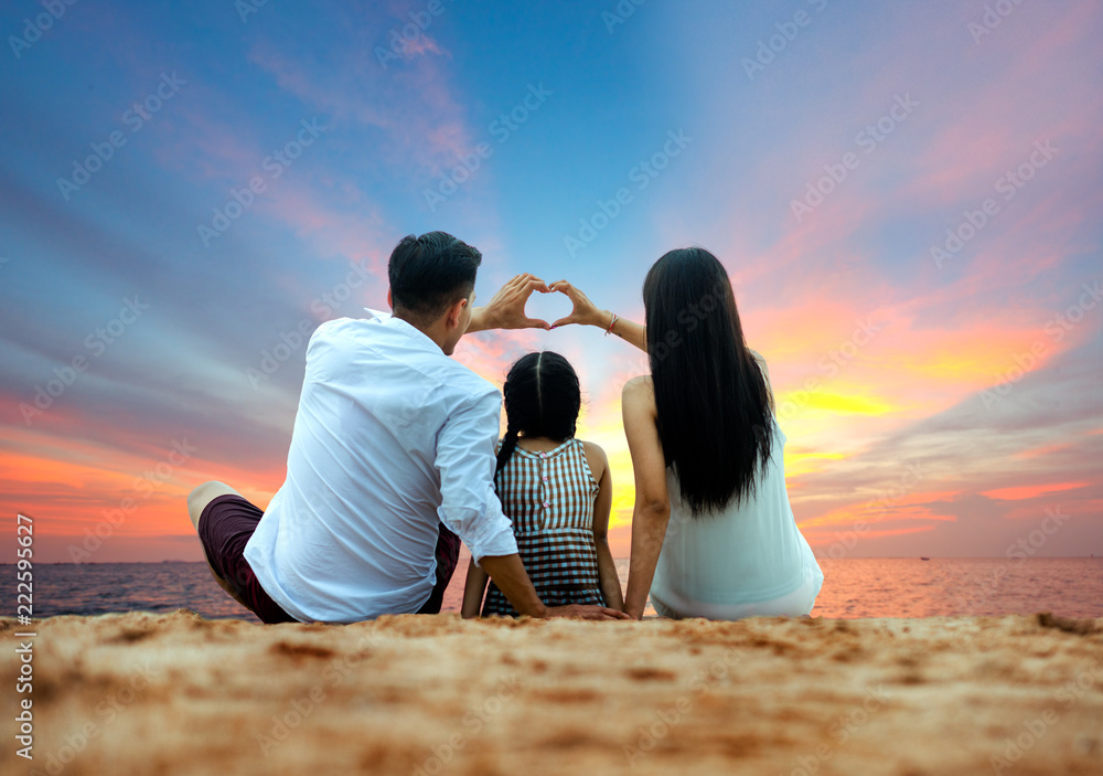 Happy asian family - father, mother, kid hold hands create in gesture of love symbol together ...