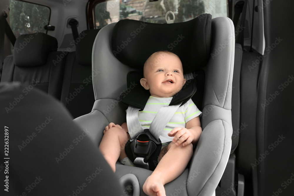 Little baby in child safety seat inside of car Stock Photo | Adobe Stock