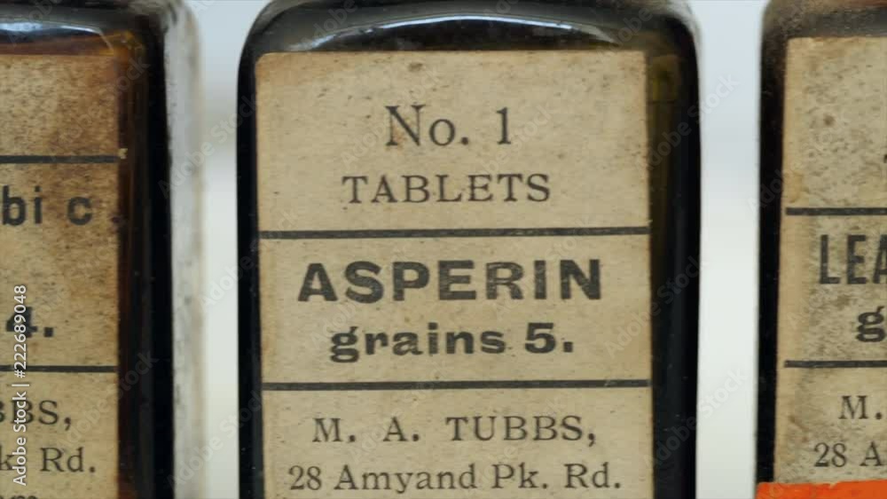 Antique aspirin bottle dating from the early 20th century. Aspirin was ...