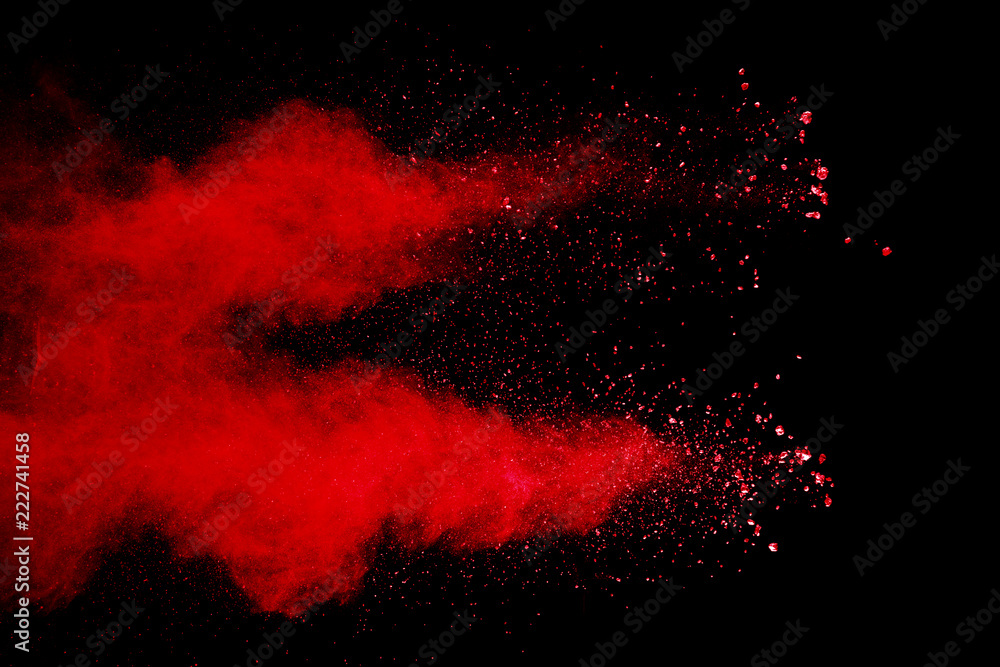 abstract red dust splattered on black background. Red powder explosion ...