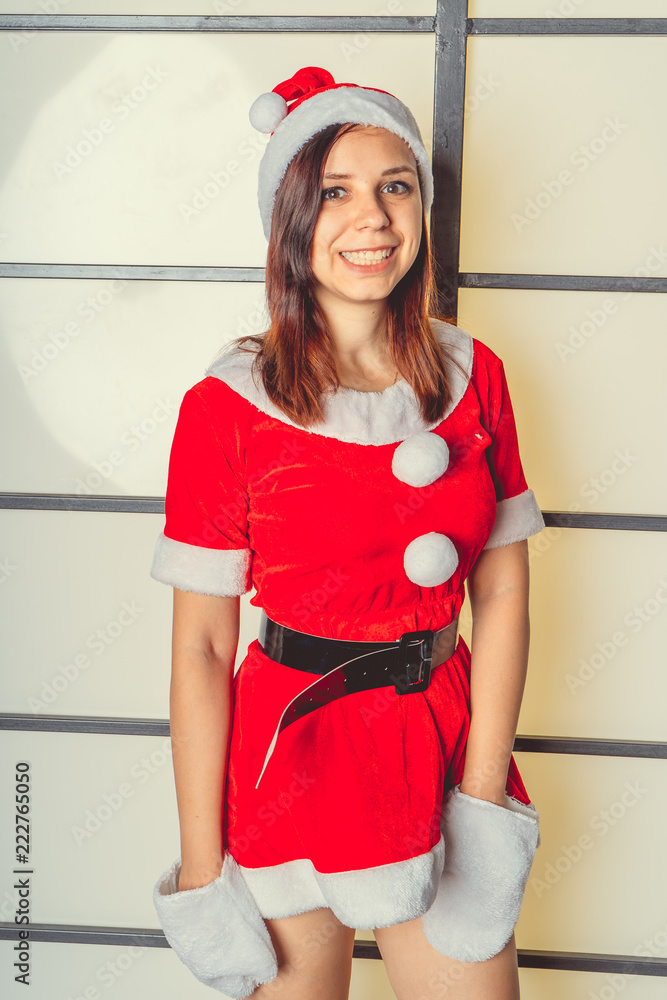 Sensual santa helper girl. Beautiful girl in Santa hat. Party ...