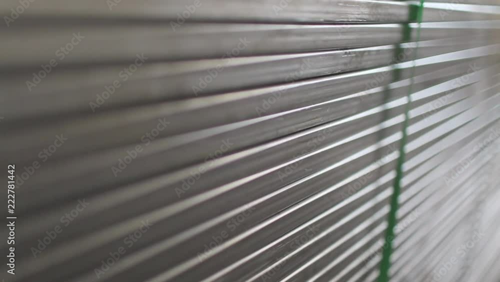 steel profiles are stacked. create profiles. metallurgy. gray stripes ...