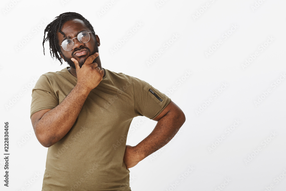 Hmm, what should guy do. Portrait of troubled focused handsome man with ...