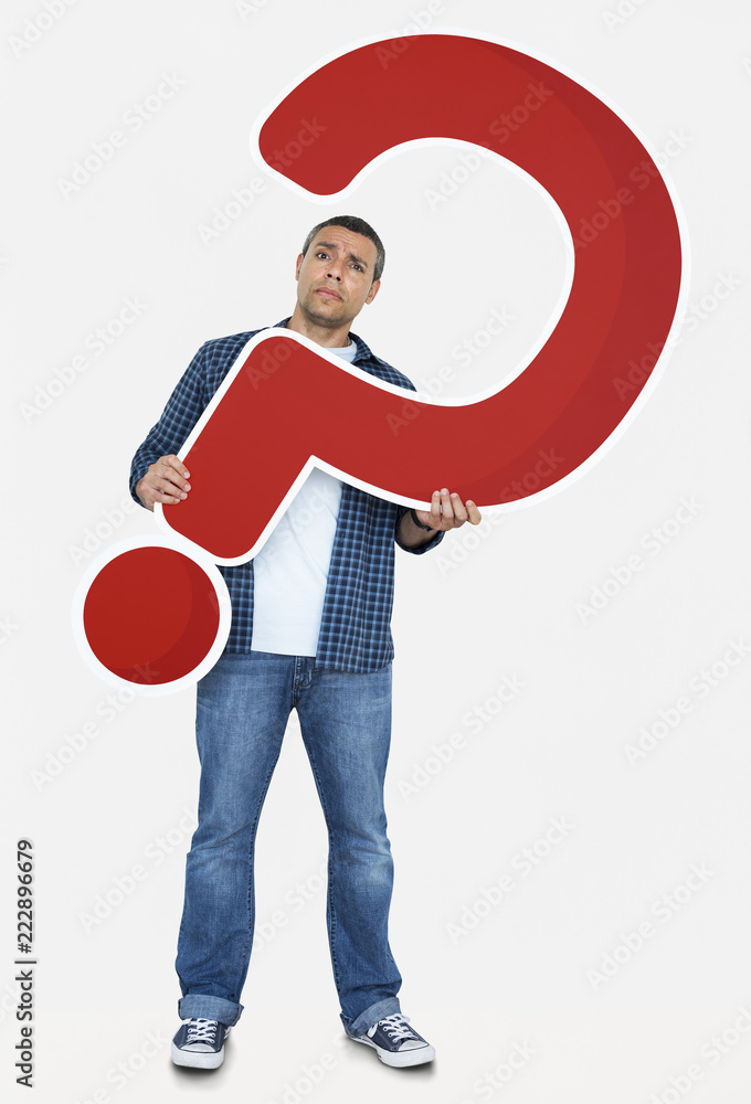 Confused man holding a question mark icon Stock Photo | Adobe Stock