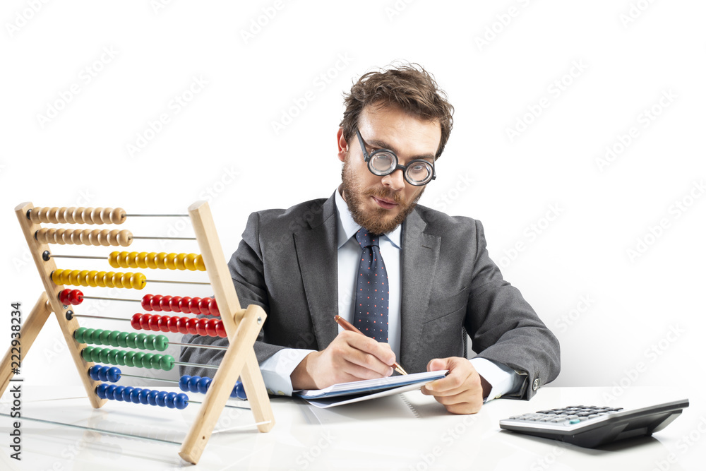 Nerd accountant does calculation of company revenue Stock Photo | Adobe ...