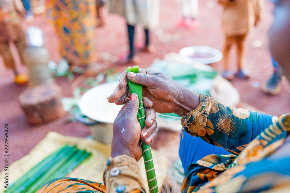 detail of african woman hand wrapping traditonal cameroonian baton de ...