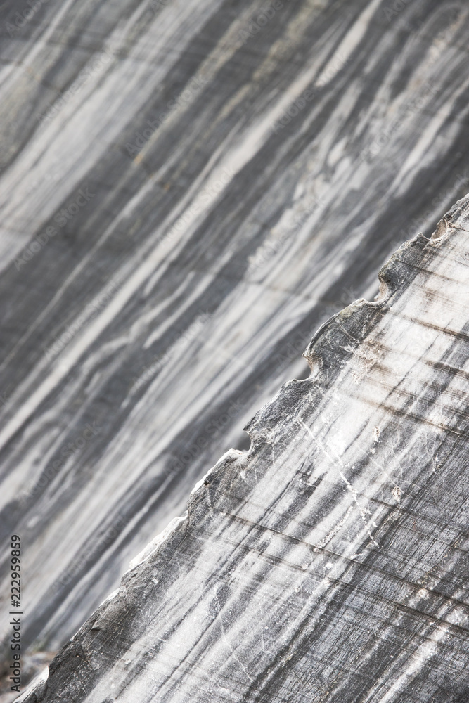Extraction of blue marble. Marble quarry closeup.Mining industry. White ...