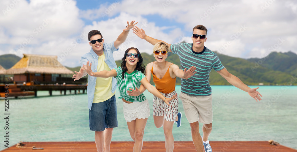 travel, tourism and summer holidays concept - group of happy smiling ...