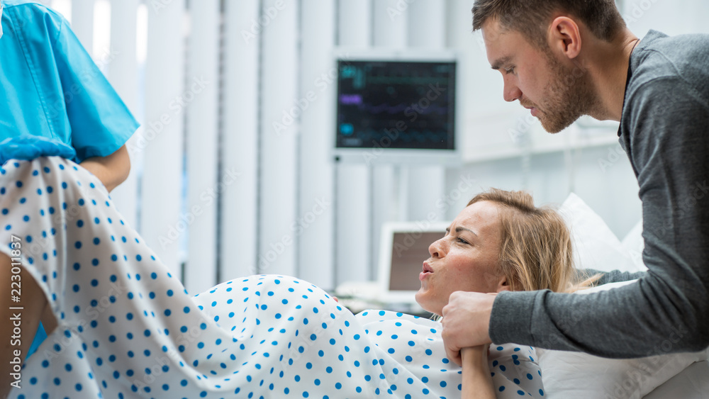 Woman In Labor With Husband