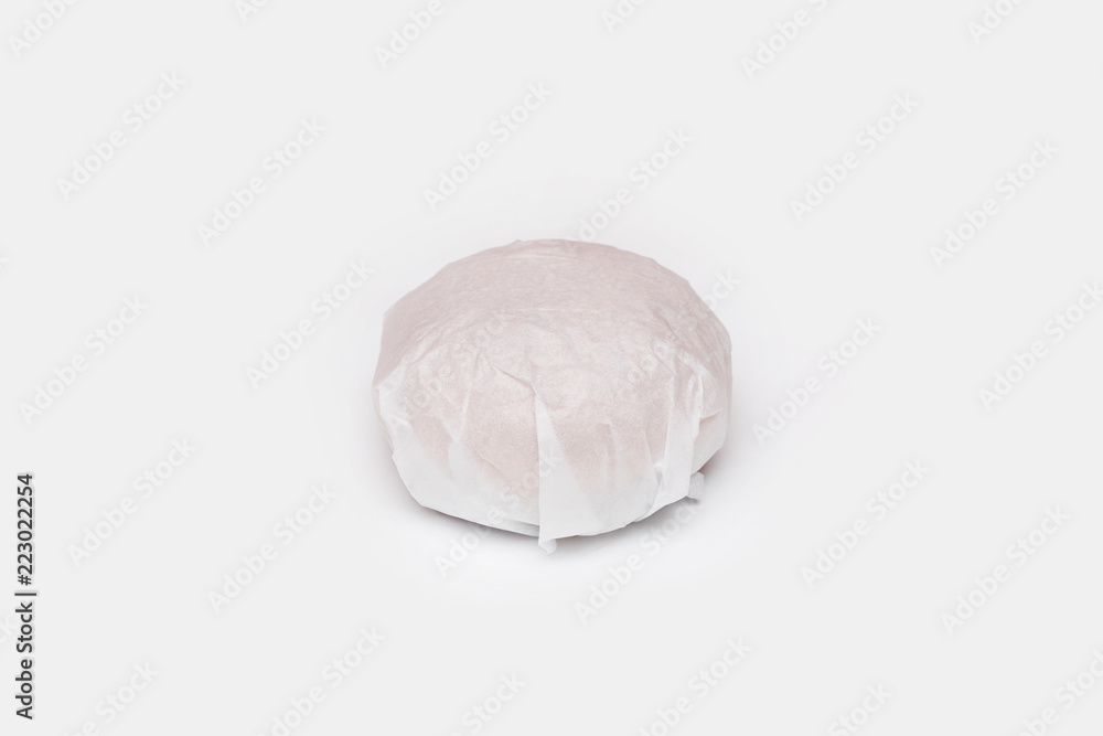 Burger, isolated on white background. Wrapped white paper. Hamburger ...
