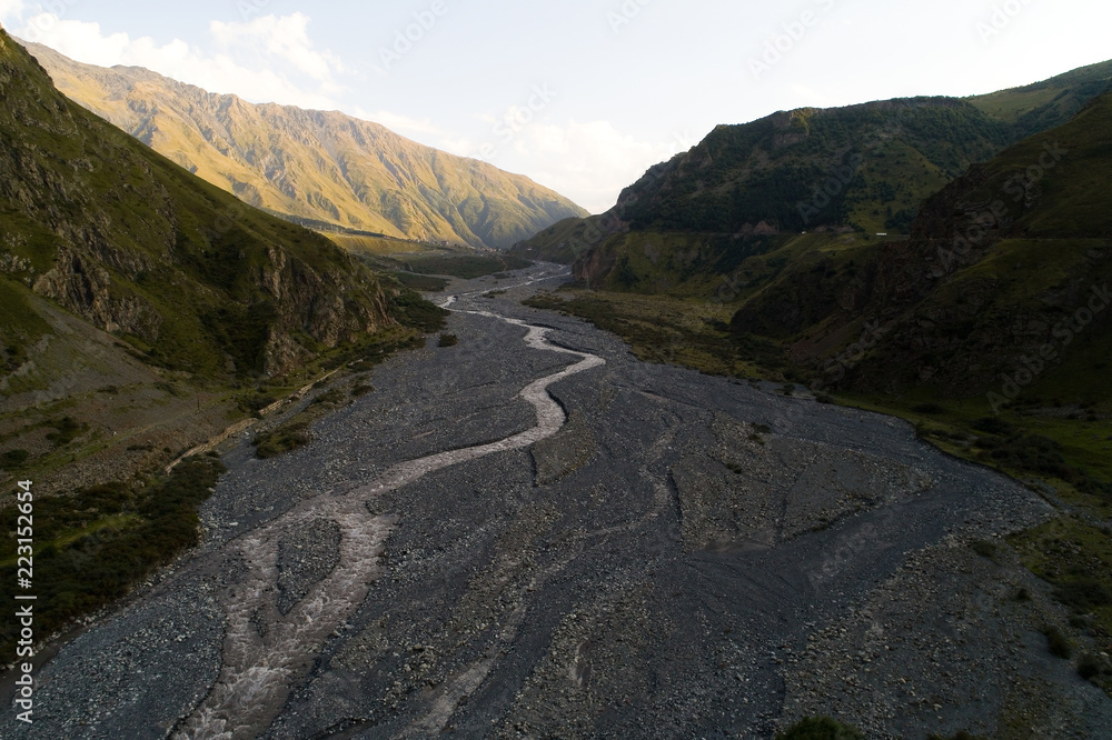 The Terek River flows through the Daryal Gorge. Stock Photo | Adobe Stock