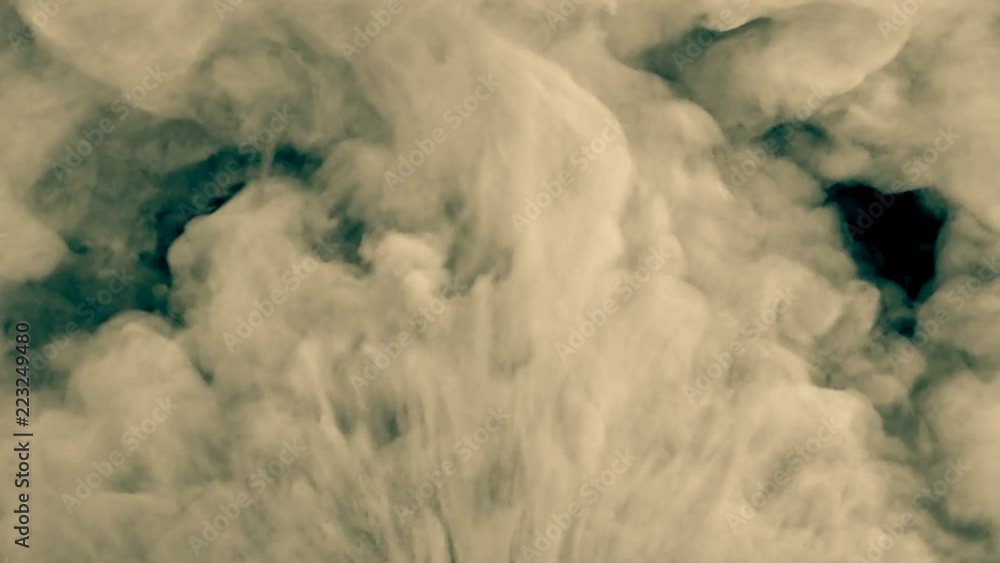 Realistic smoke puff fills the screen in slow motion. Bright yellow ...