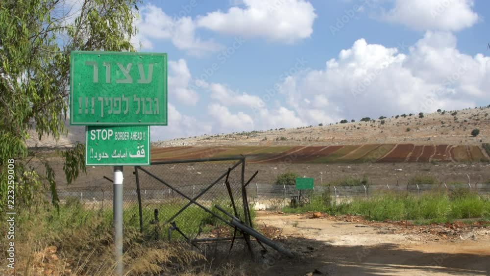 a warning Sign: Stop! border ahead.a border demarcation between Lebanon ...